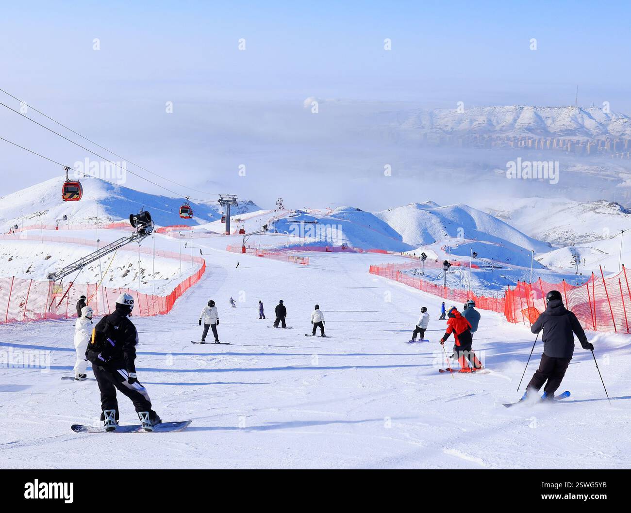 ALTAY, CHINA - FEBRUARY 21, 2025 - Snow lovers ski at the International ...
