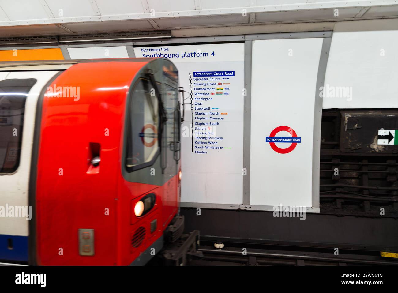 Tottenham Court Road underground station, London, UK, with a moving ...