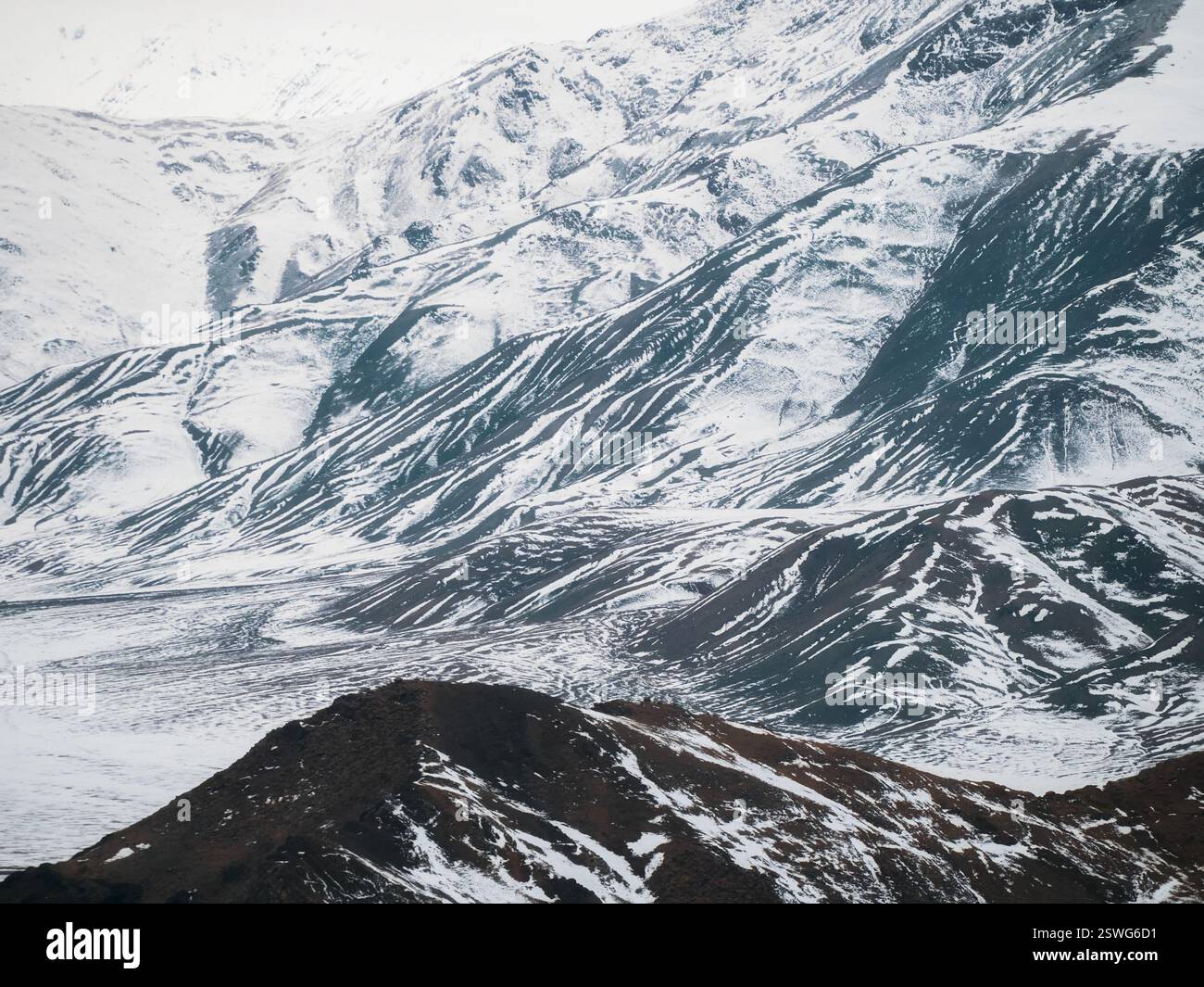 Scenic minimalist landscape with sunlit snowy mountain wall. Texture of ...