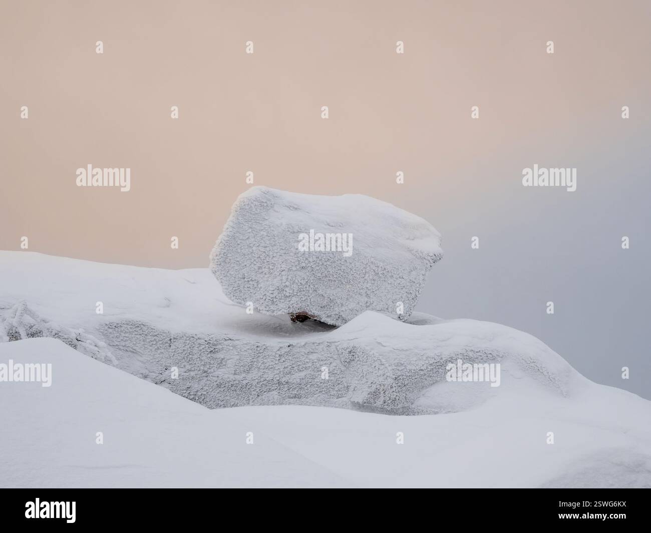 Falling large boulder on the edge of the abyss Stock Photo - Alamy