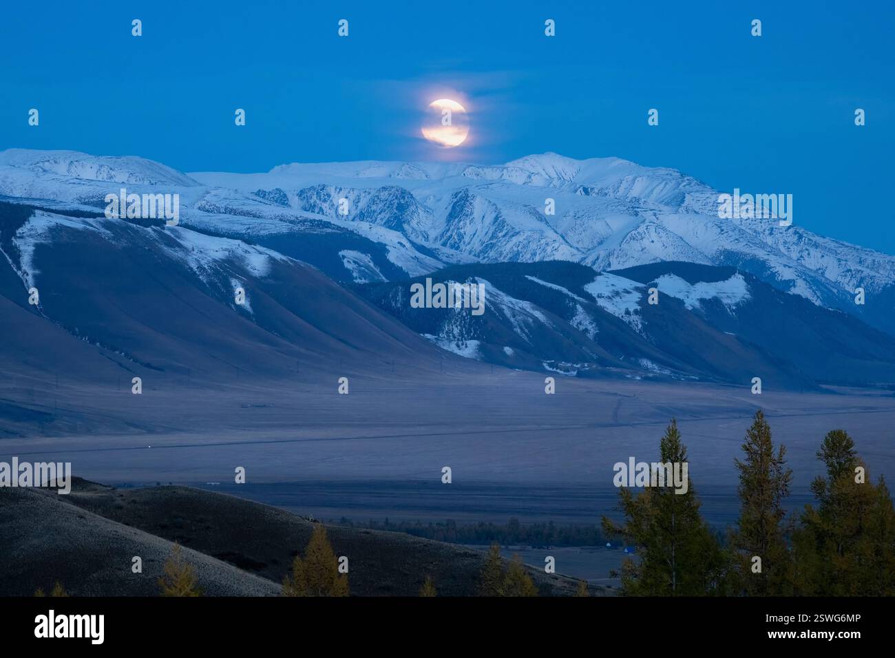 Amazing mystical moonlit night in a mountain valley Stock Photo - Alamy