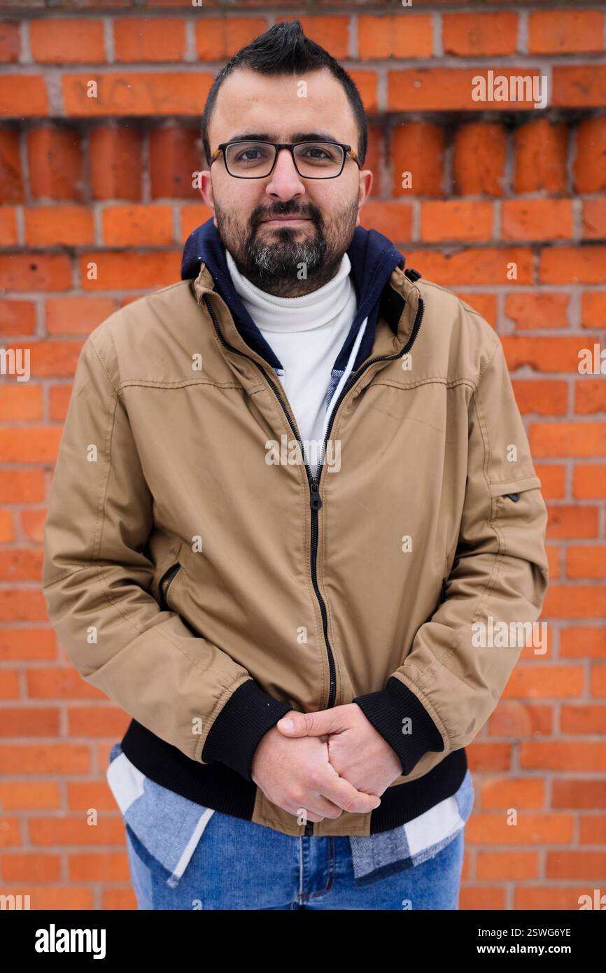 Syamend Al Othman 31, coming to Germany in 2014 from Syria, pose for a ...