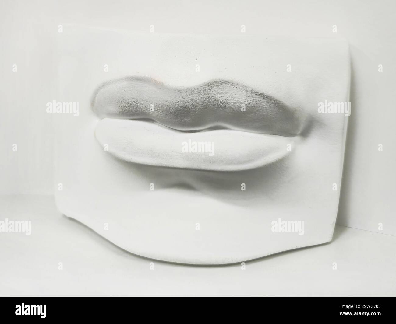 Gypsum plaster cast human lips Stock Photo - Alamy