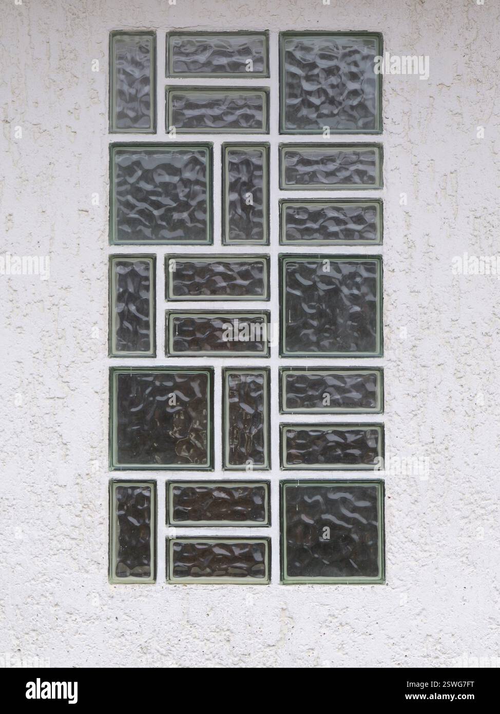 Glass blocks. White facade with glass bricks in 70s retro style. Ideal ...