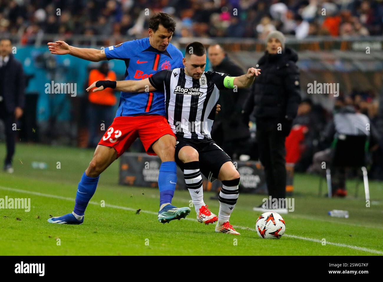 Bucharest, Romania. 20th Feb, 2025. Risto Radunovic (L) of FCSB vies ...