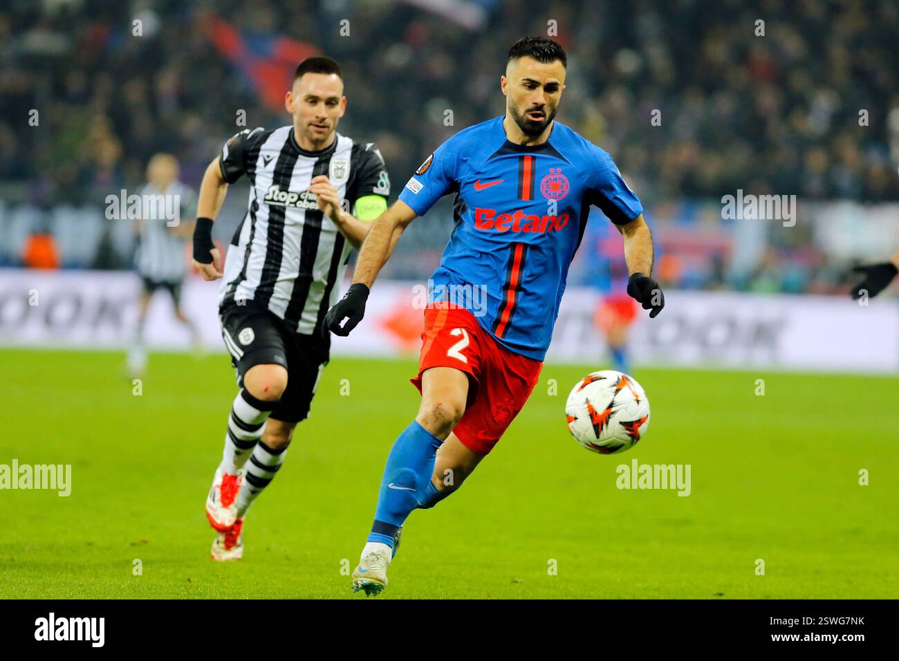 Bucharest, Romania. 20th Feb, 2025. Valentin Cretu (R) of FCSB vies ...