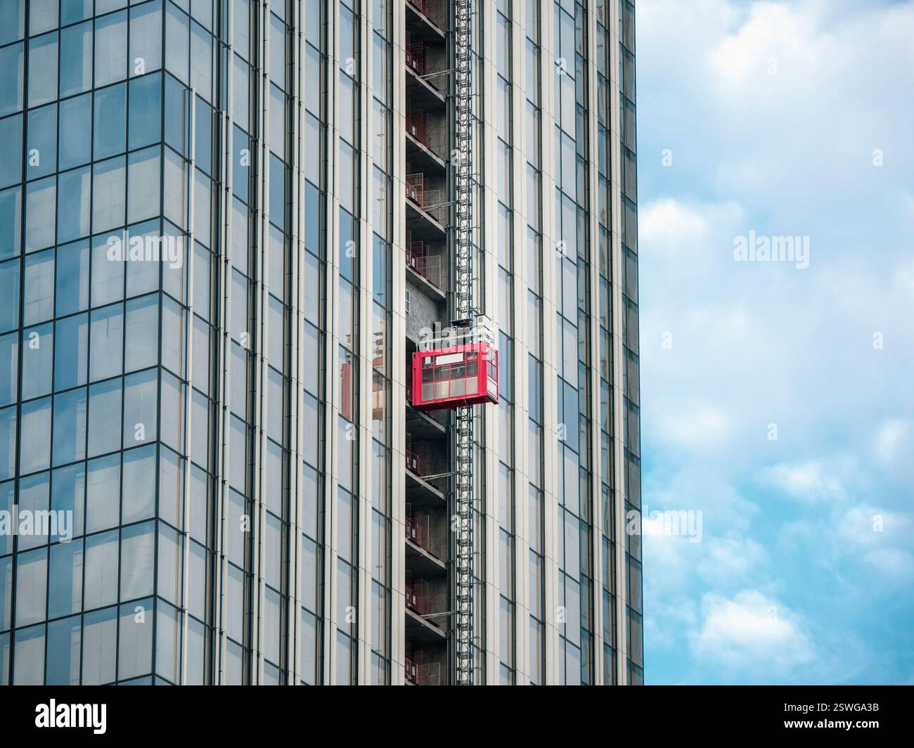 Elevators lifts to the construction sites of a skyscraper under ...
