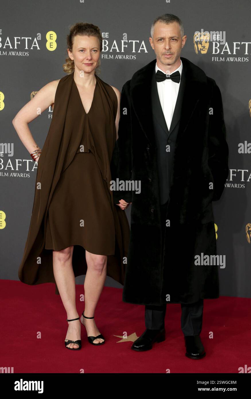Emma Wall and Jeremy Strong attend the 2025 BAFTA Film Awards at The ...