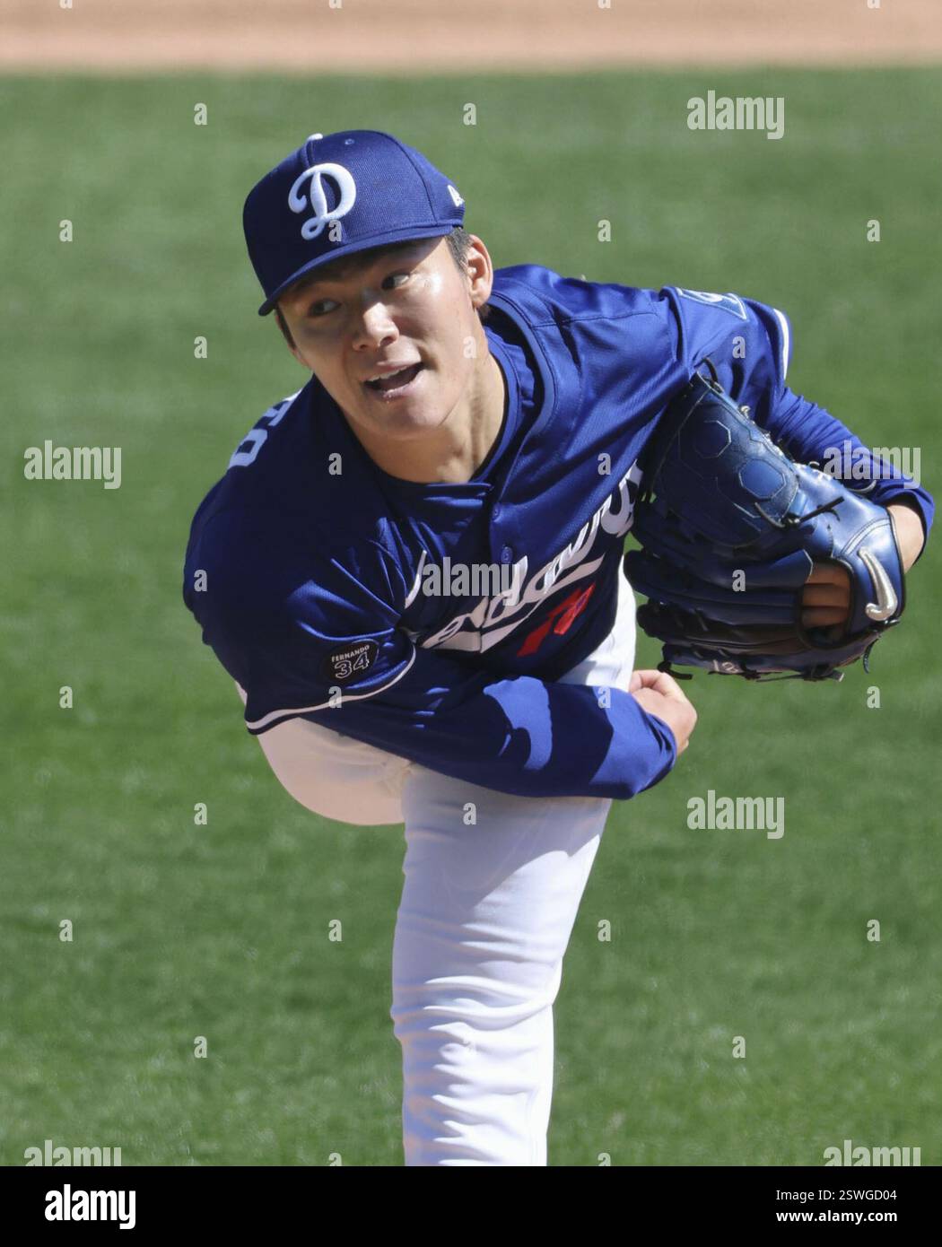 Los Angeles Dodgers pitcher Yoshinobu Yamamoto pitches in a spring ...
