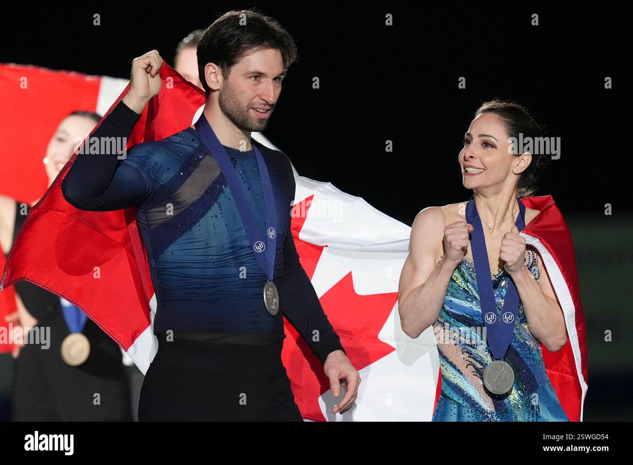 Silver medalists Deanna Stellato-Dudek, right, and Maxime Deschamps of ...