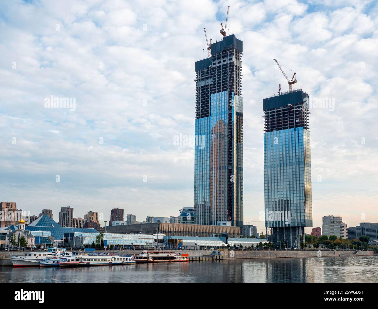Construction work site and high rise building. High-rise building under ...
