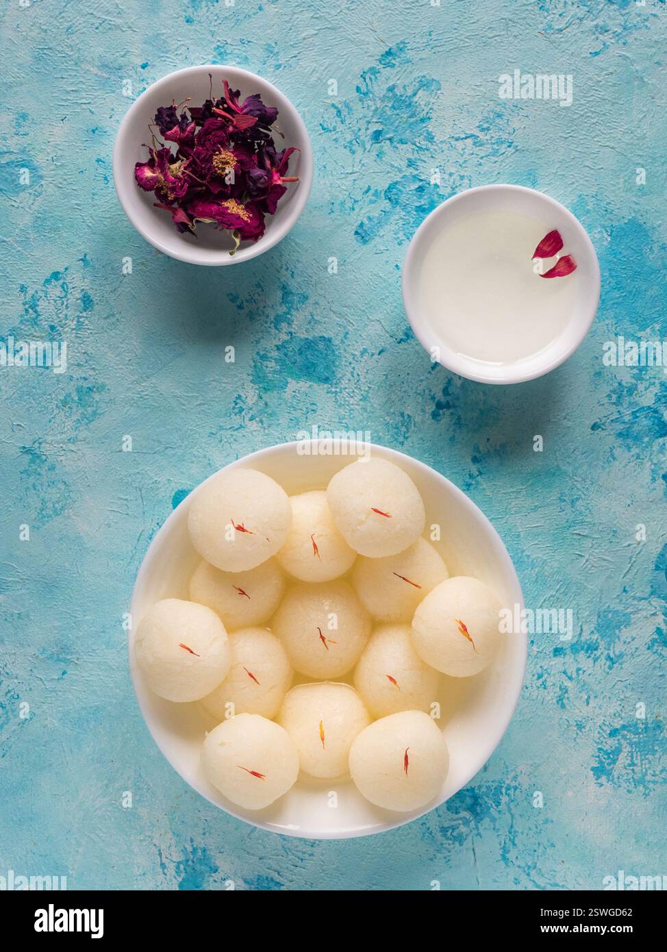 Indian Rasgulla dessert. Sweet served in a bowl, top view Stock Photo ...