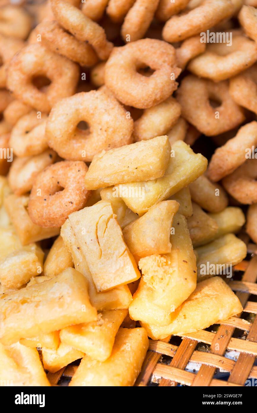 Myanmar, Mandalay, various fried snacks for sale in the Mahar Muni ...