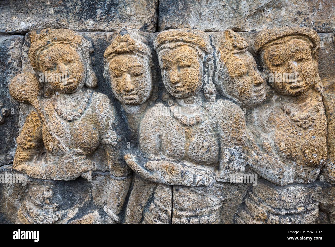 Bas-reliefs of women on Borobudur Temple, Java, Indonesia Stock Photo ...