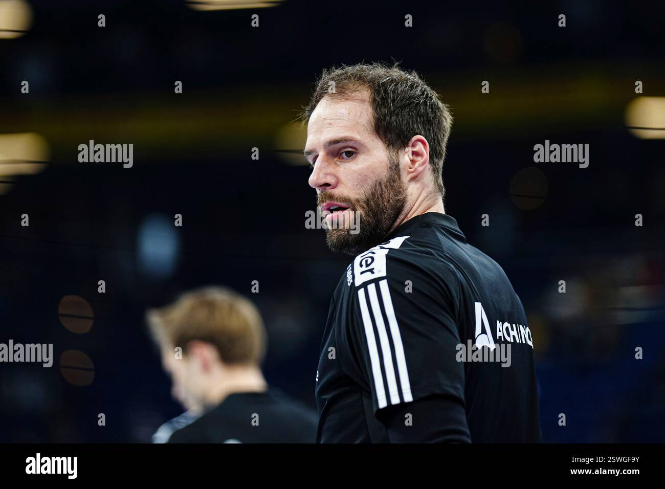 Kiel, Deutschland. 20th Feb, 2025. Nico Buedel (HC Erlangen, #20) GER ...