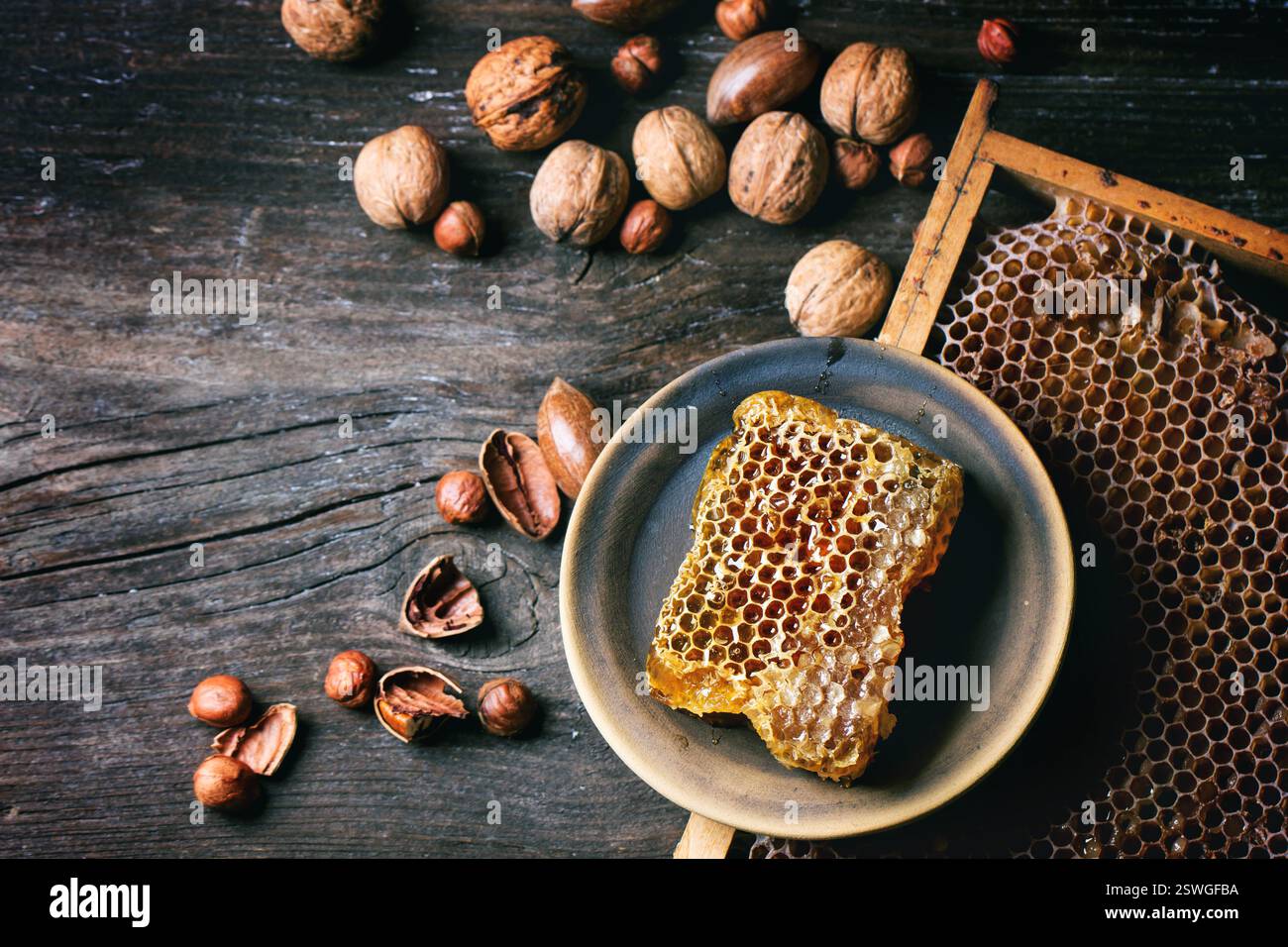 Honeycomb and nuts Stock Photo - Alamy