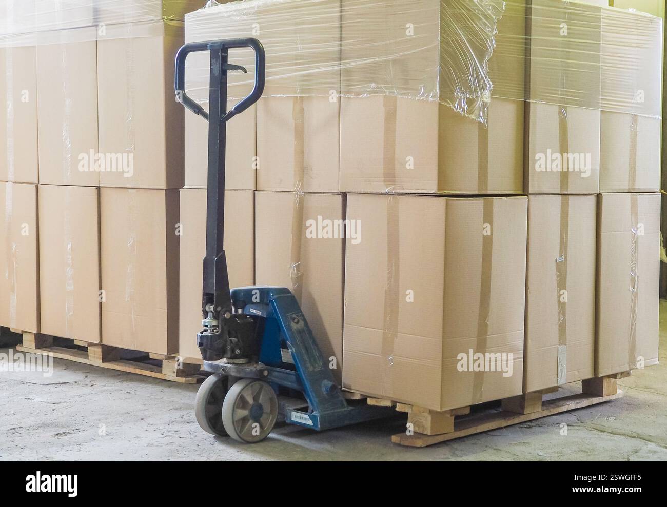 Stack of carton boxes on pallet ready for transport Stock Photo - Alamy