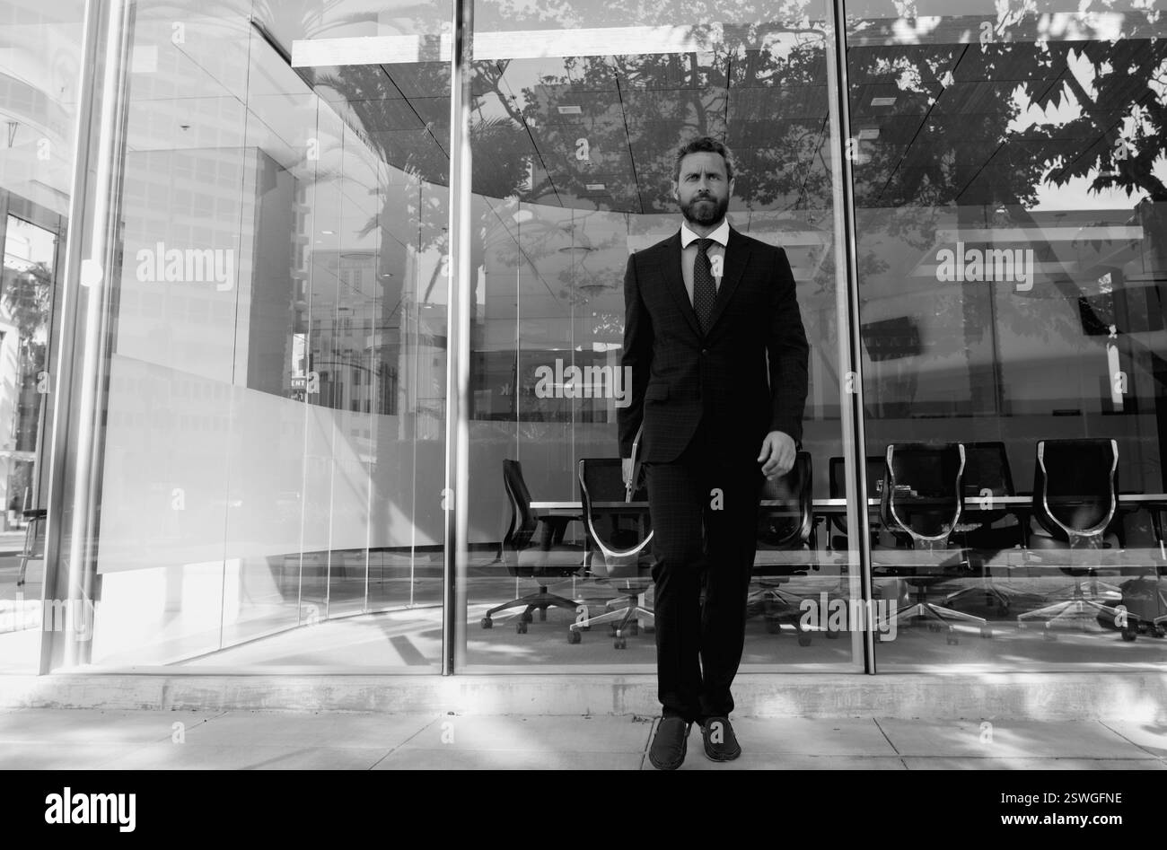 Executive businessman walking. Portrait of ceo near modern office in ...