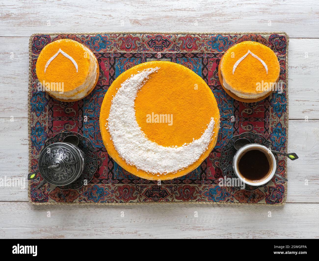 Delicious homemade golden cake with a Crescent moon, served with black ...