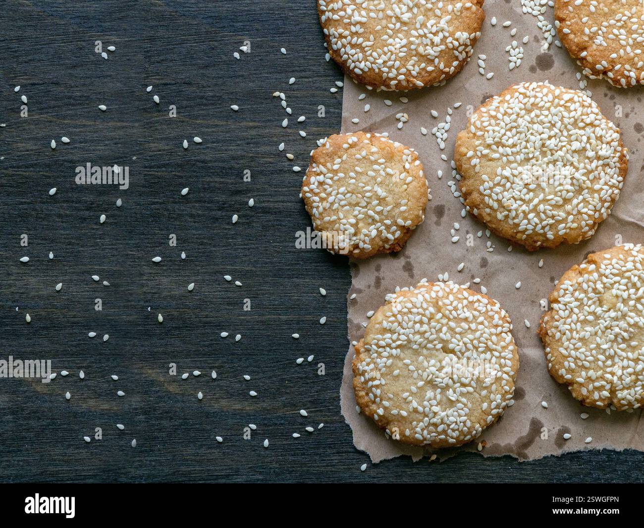 Homemade Vegan Tahini cookies are laid out on a dark table Stock Photo ...