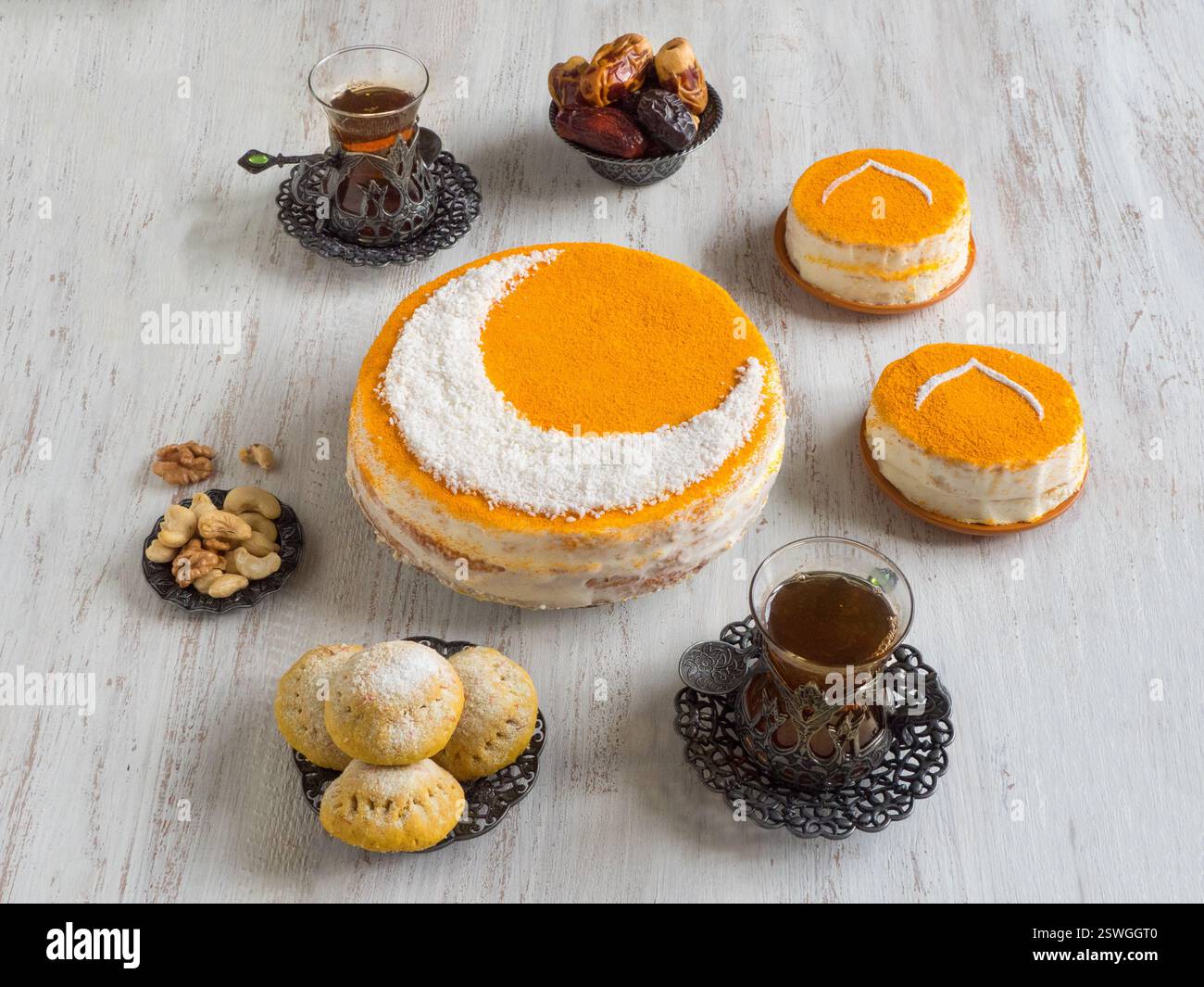 Homemade golden cake with a Crescent moon, served with tea cup and ...