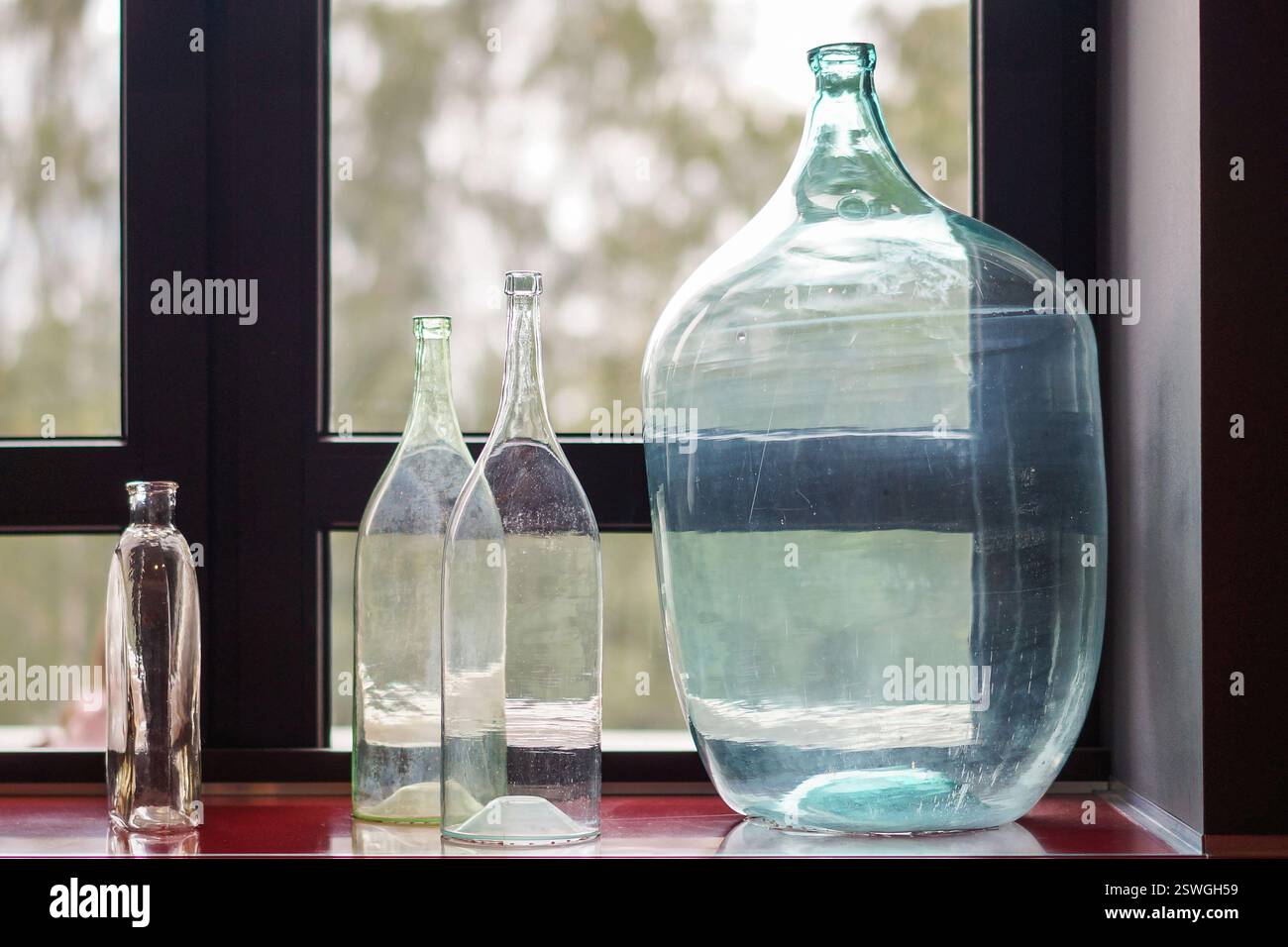Glass bottles of various shapes and sizes Stock Photo - Alamy