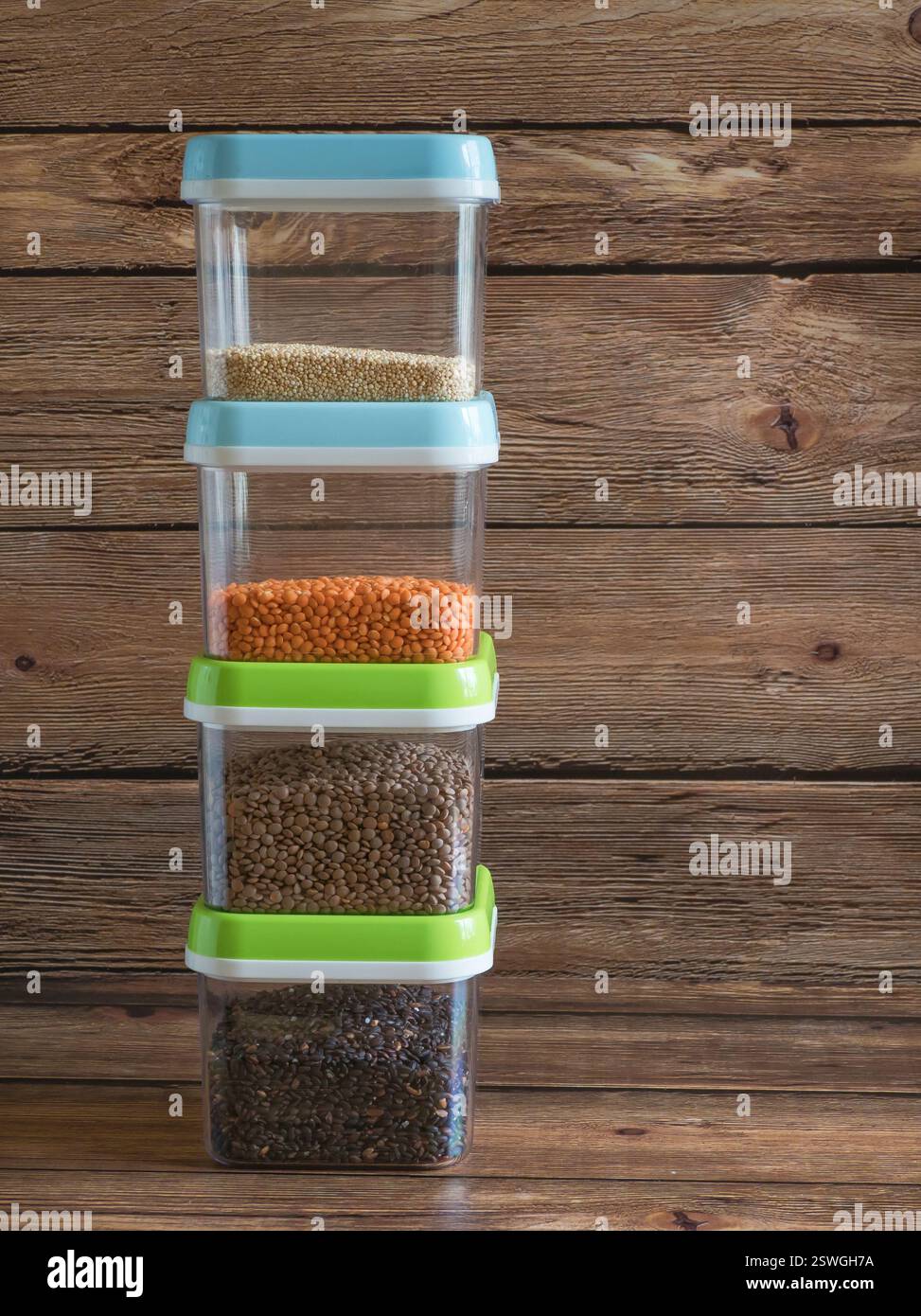 Plastic containers with cereals. Home storage products Stock Photo - Alamy