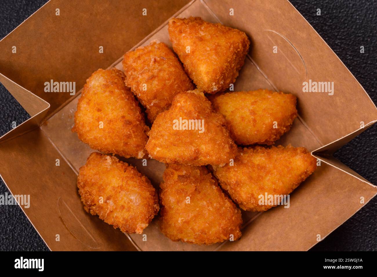 Brie cheese or camembert fries in breading, fast food, takeaway Stock ...