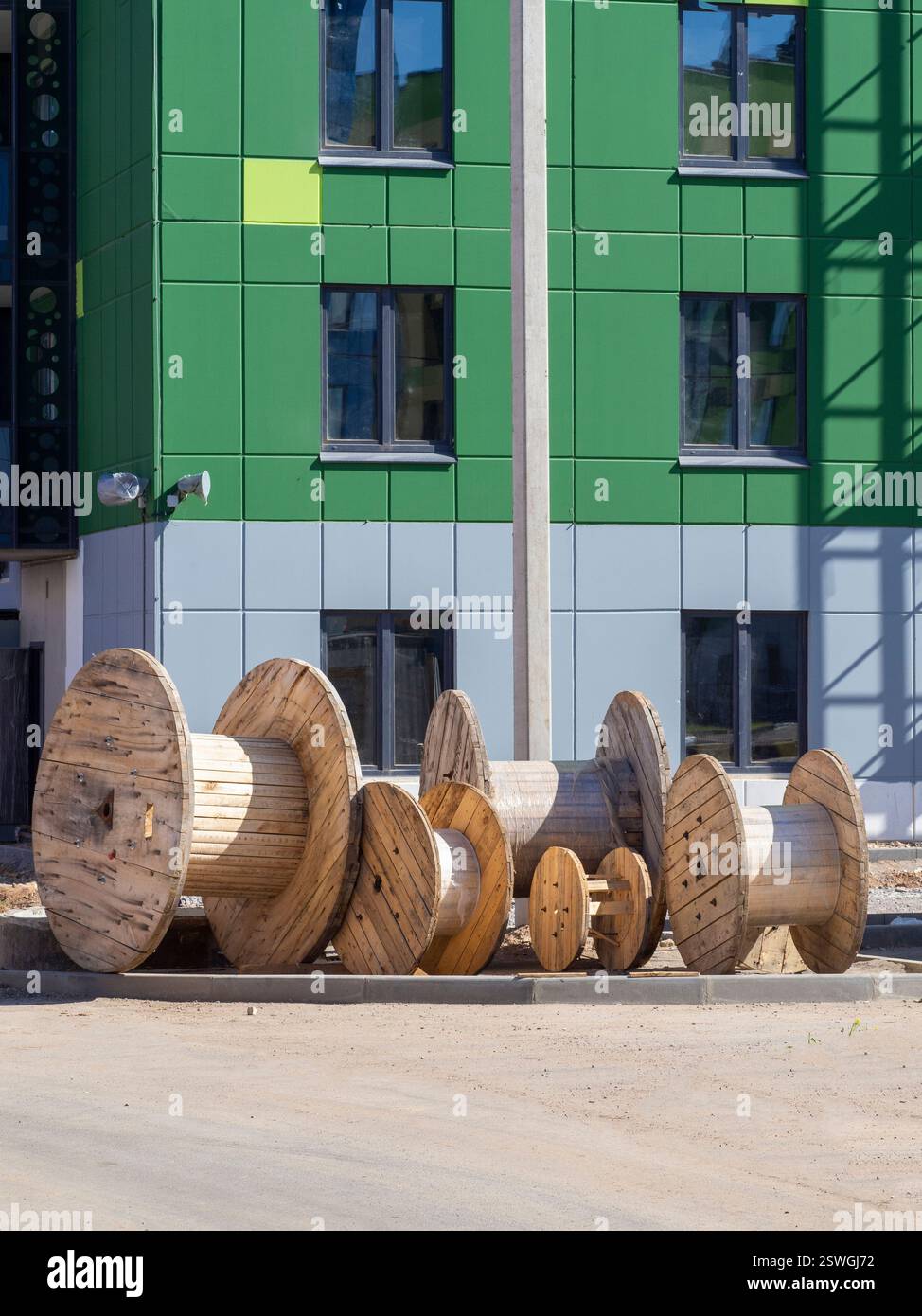 Wooden coil for electric cable on an industrial construction site Stock ...