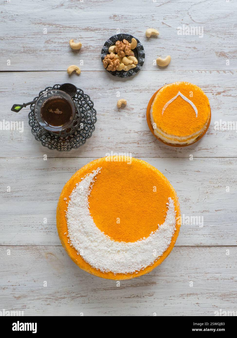 Homemade golden cake with a Crescent moon, served with tea cup and ...
