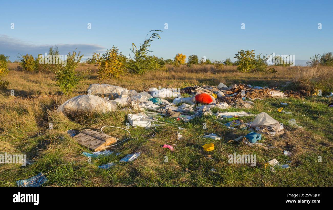 Landfill waste in nature. The problem of ecology and environmental ...