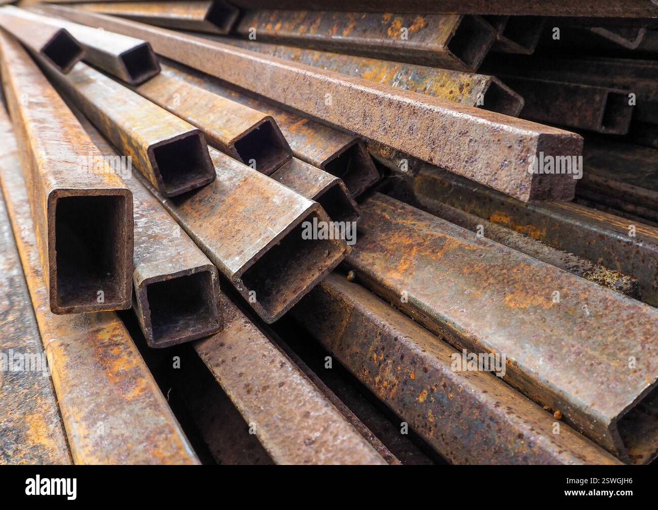 Background of rusty construction rebar, pipe and channel Stock Photo ...