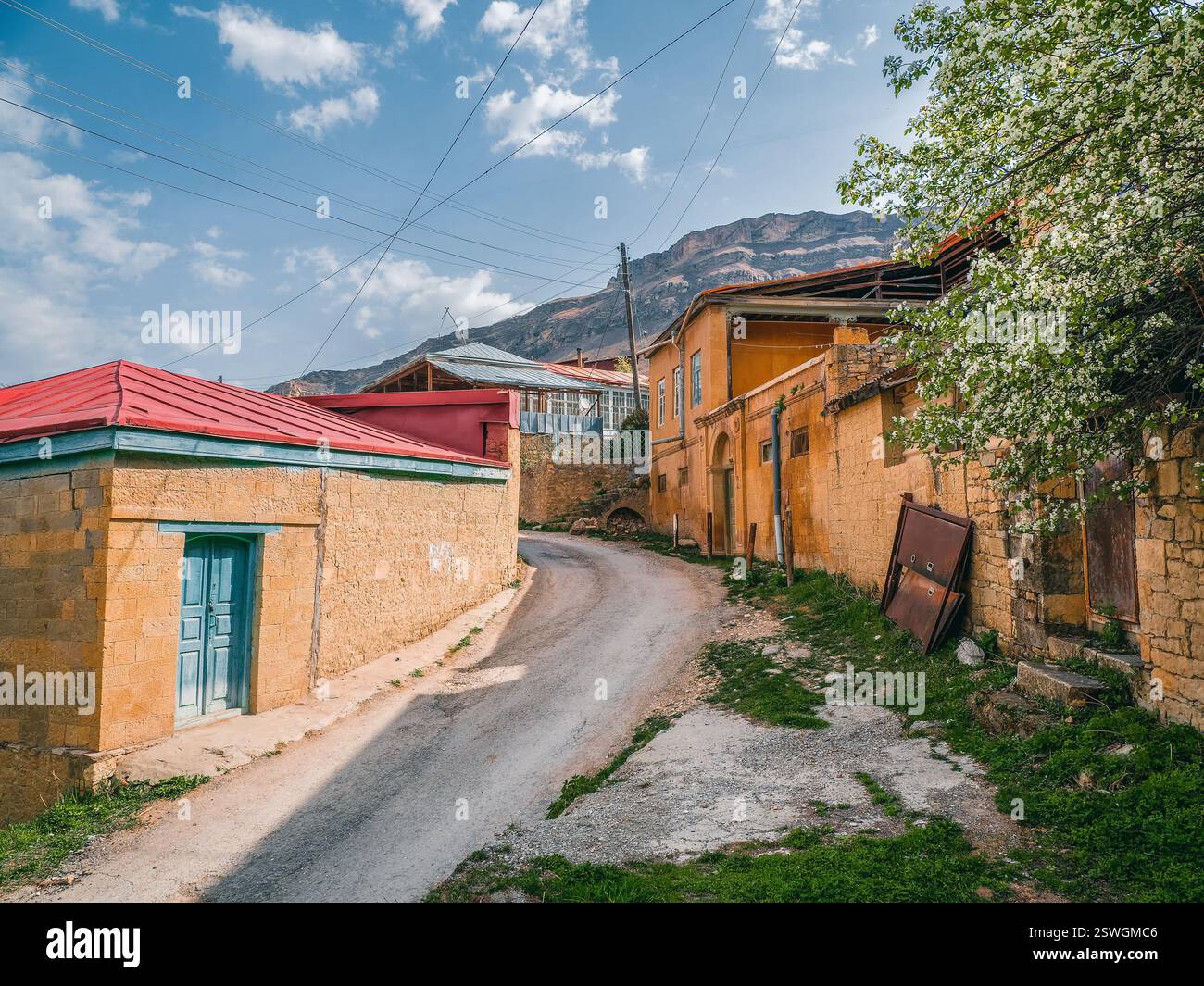 Old mountain village in Dagestan. Rural street between stone houses in ...