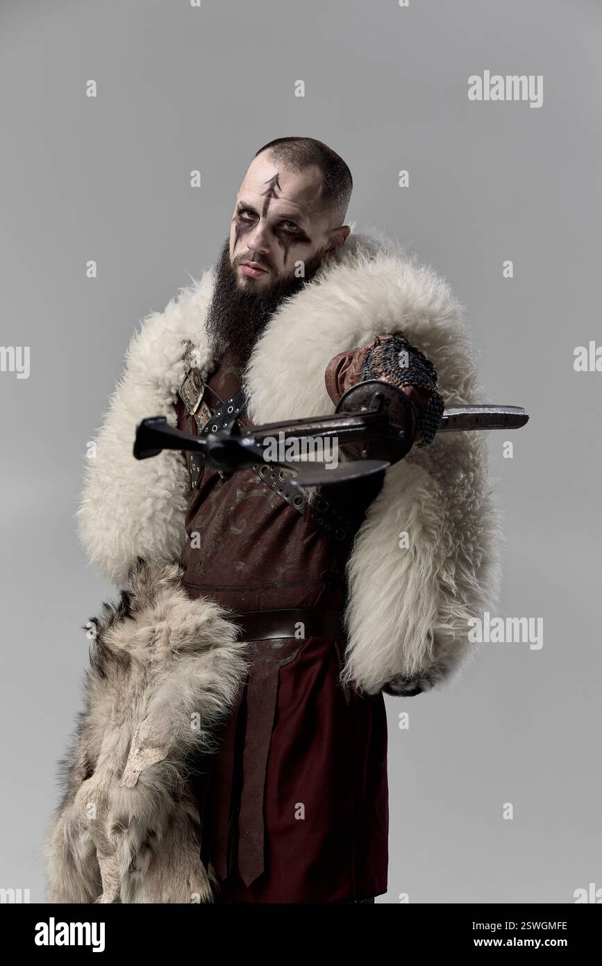 Scandinavian mythology. Portrait of man as medieval Viking, warrior ...