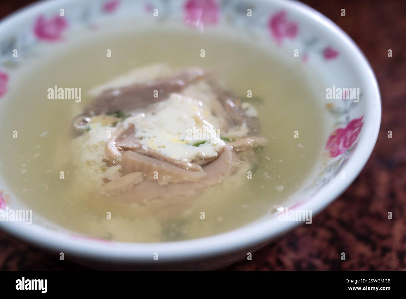 Delicious street food pig bone marrow soup with boiled egg drop in ...