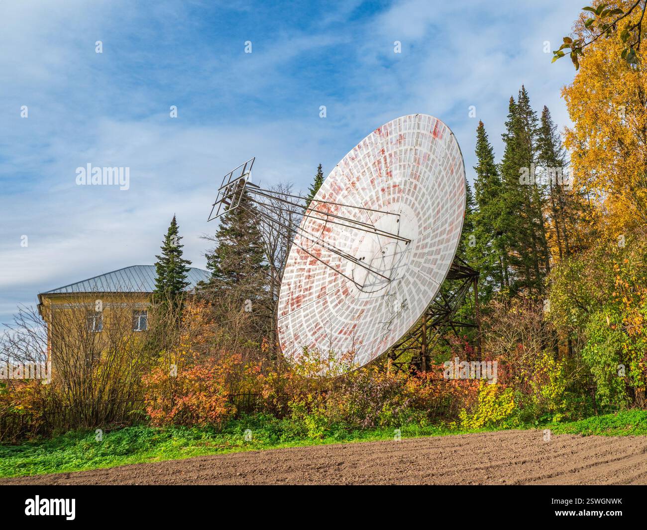 Vintage Radio Telescope, a large satellite dish on a background of ...