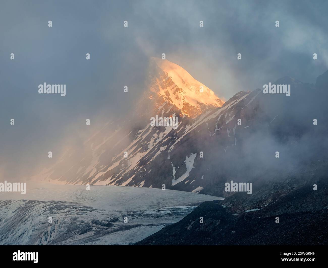 Soft focus. Minimalist mountain landscape with fiery snow peak ...