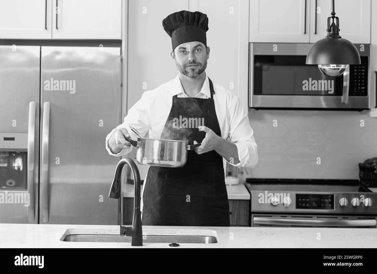 Hispanic chef male Black and White Stock Photos & Images - Alamy