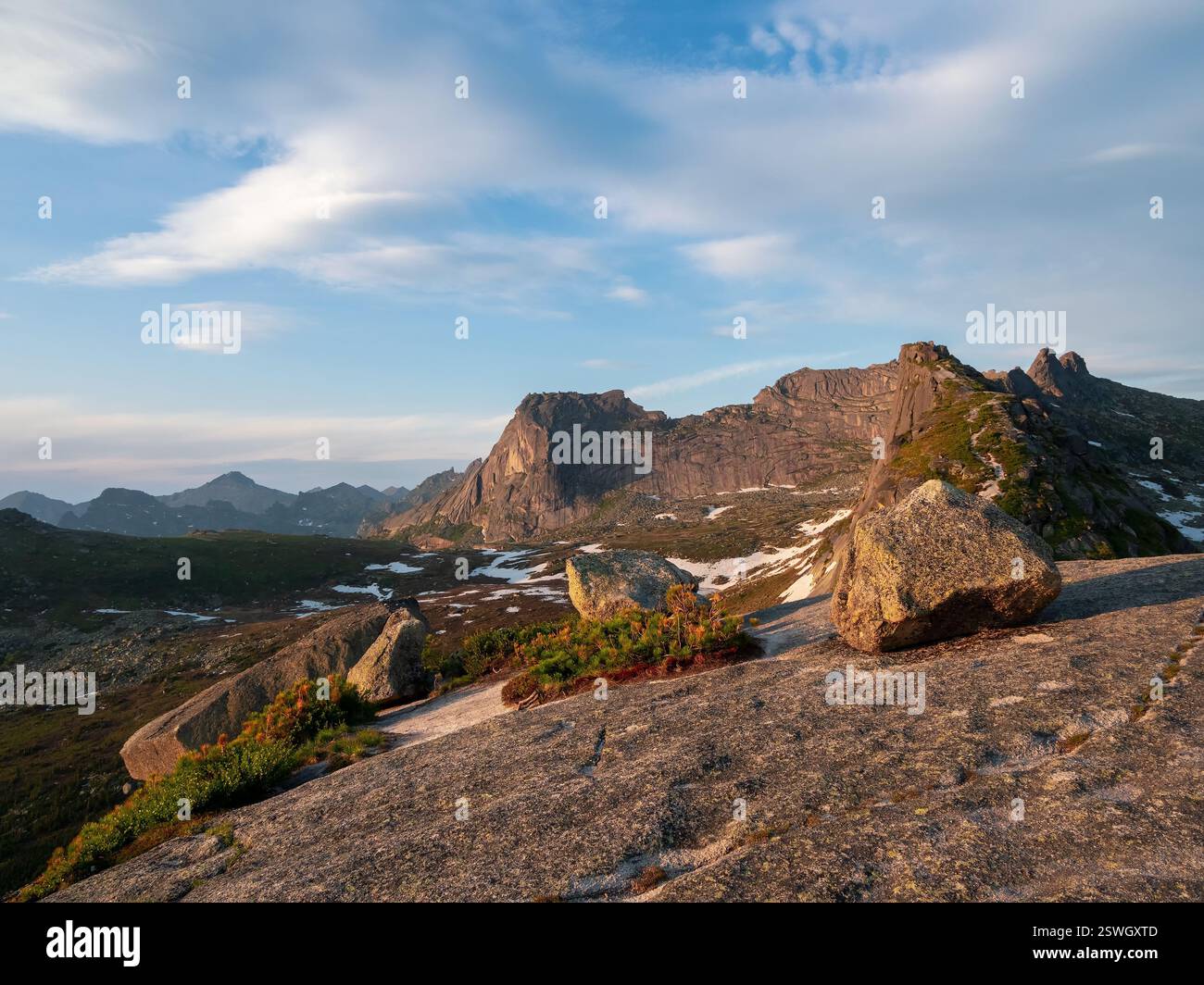 The Sleeping Sayan rock massif Stock Photo - Alamy