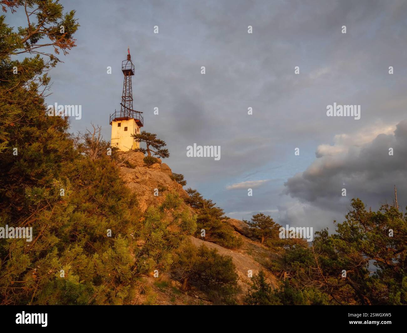 An old abandoned TV tower on top of Sokol Mountain in Crimea. Dramatic ...