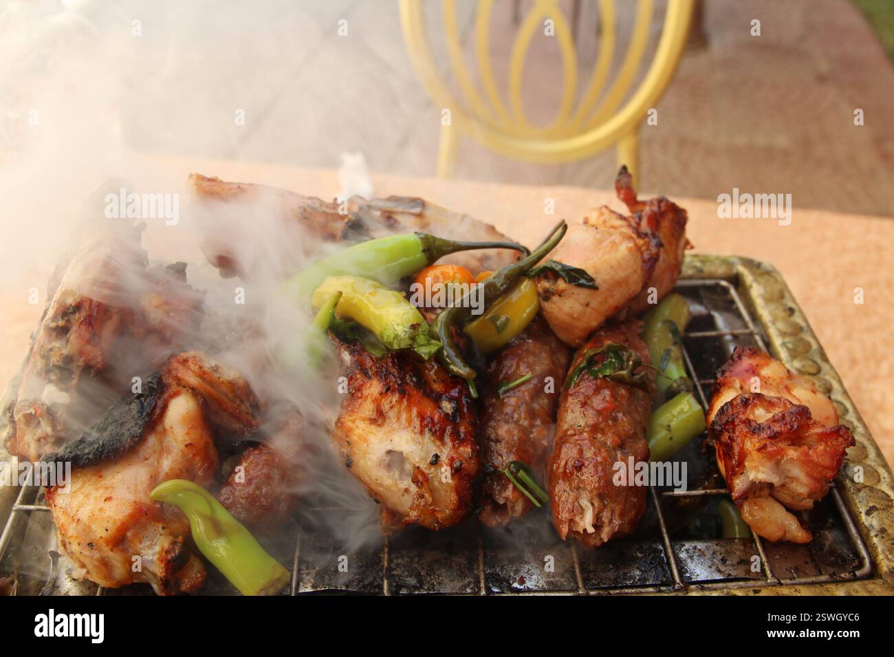 Grilled Arabic-style chicken and beef served hot in a Cairo restaurant ...