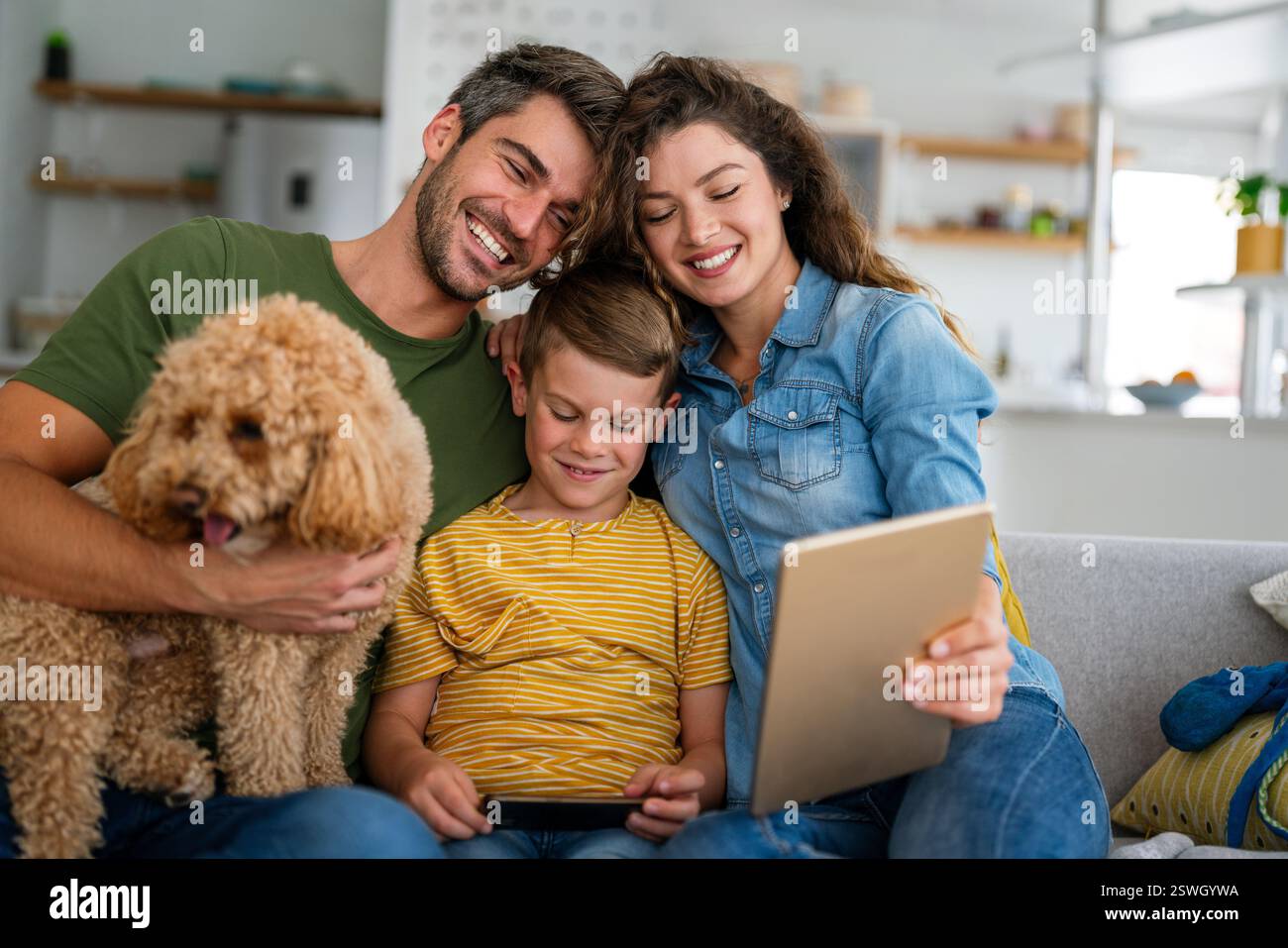 Happy family, parents with cute excited small kids son using laptop ...