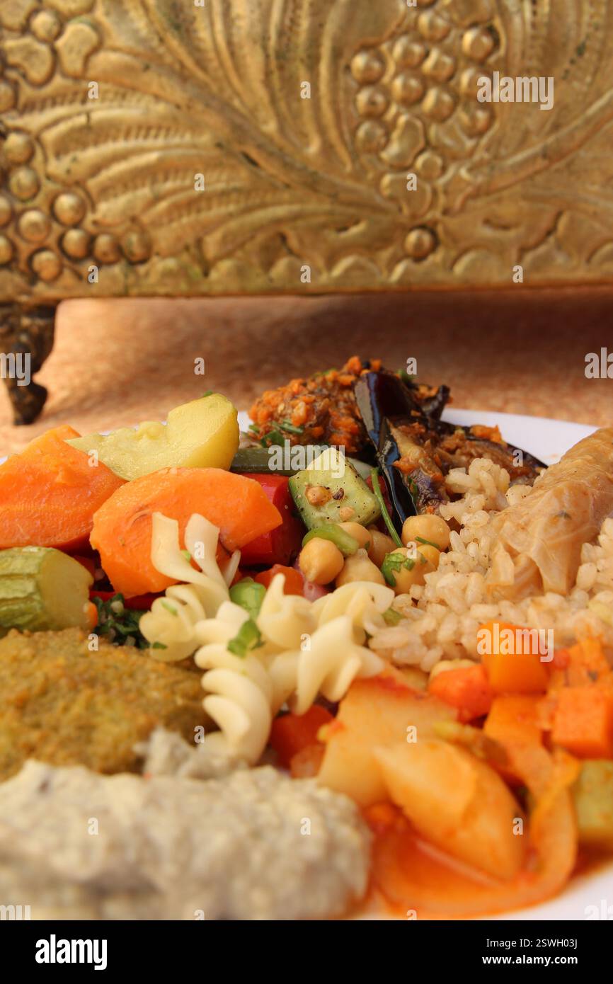 Egyptian rice with marinated vegetables and dipping sauce in a Cairo ...