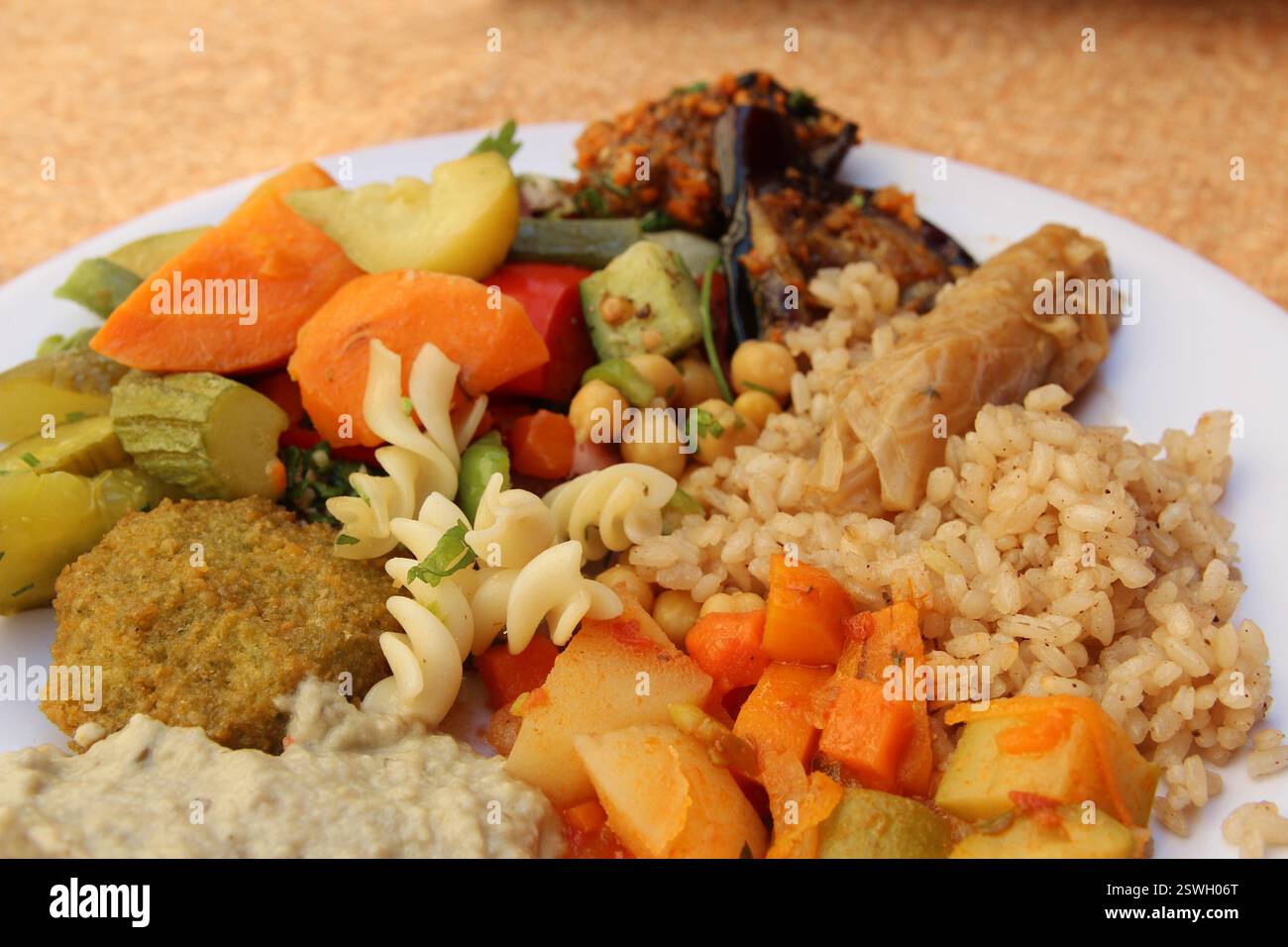 Egyptian rice with marinated vegetables and dipping sauce in a Cairo ...