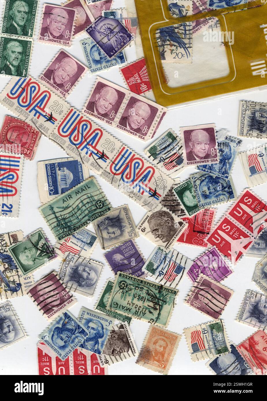 flat lay of a collection of vintage stamps from the united states of ...