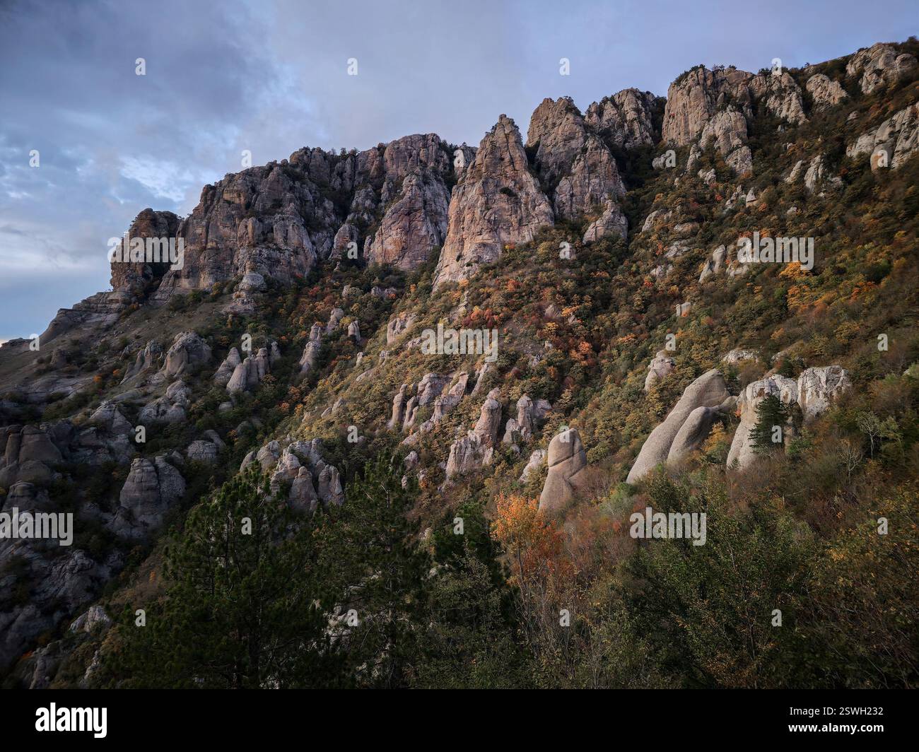 Ancient crumbling mountains in dawn. Mountains in southern part of ...