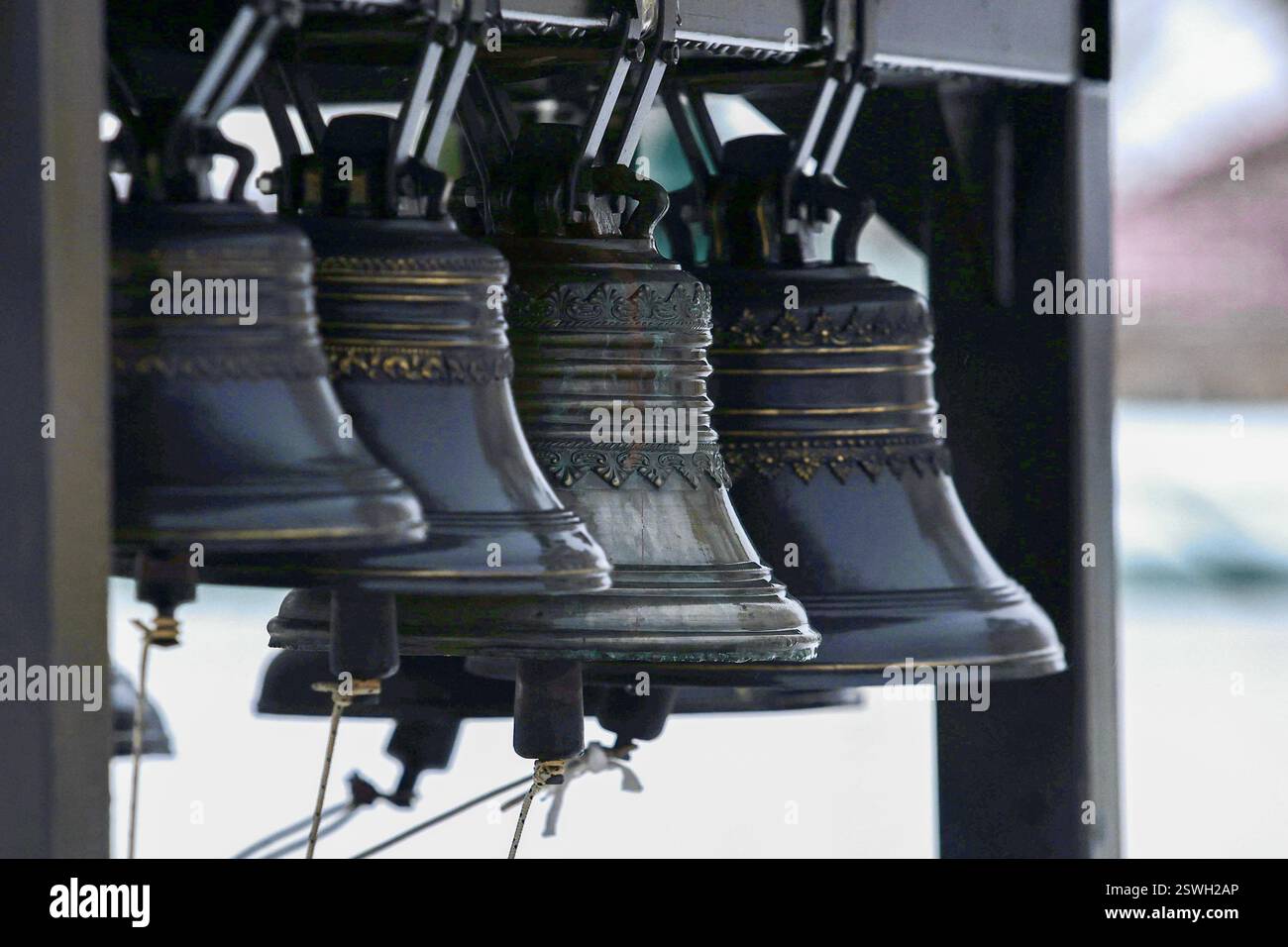 Selective focus. Ancient church tower big bell close up. Church bells ...