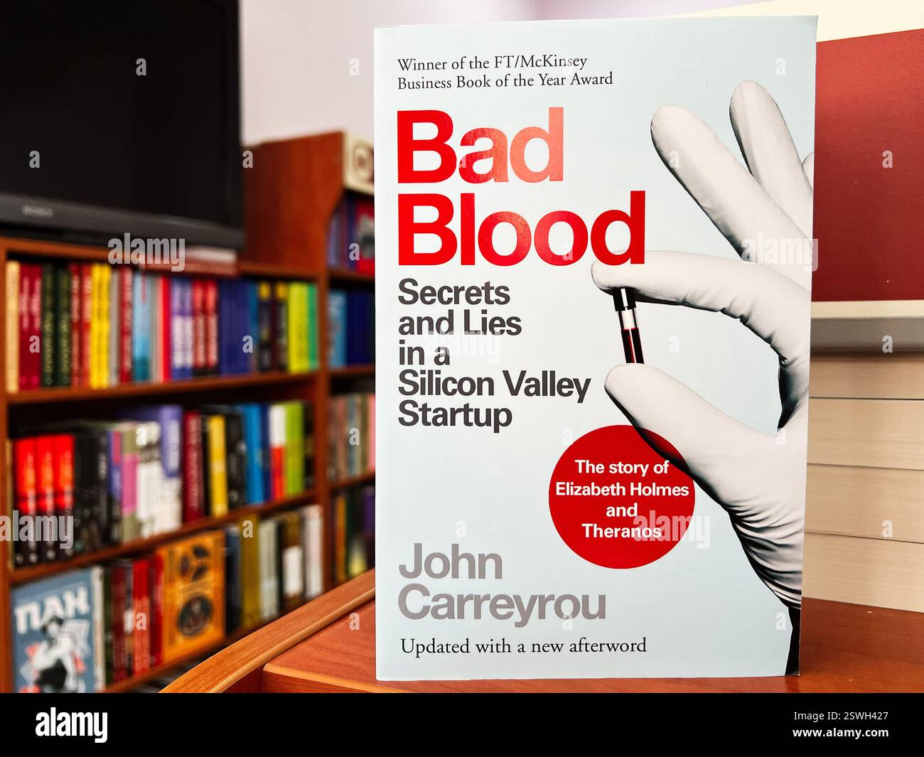 Lviv, Ukraine - February 20, 2025: Bad Blood by John Carreyrou. A comprehensive overview of a ...