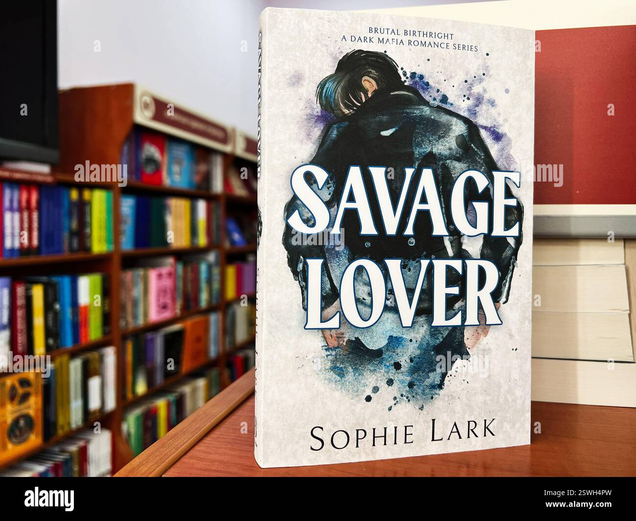 Lviv, Ukraine - February 20, 2025: A captivating romance book Savage Lover by Sophie Lark ...