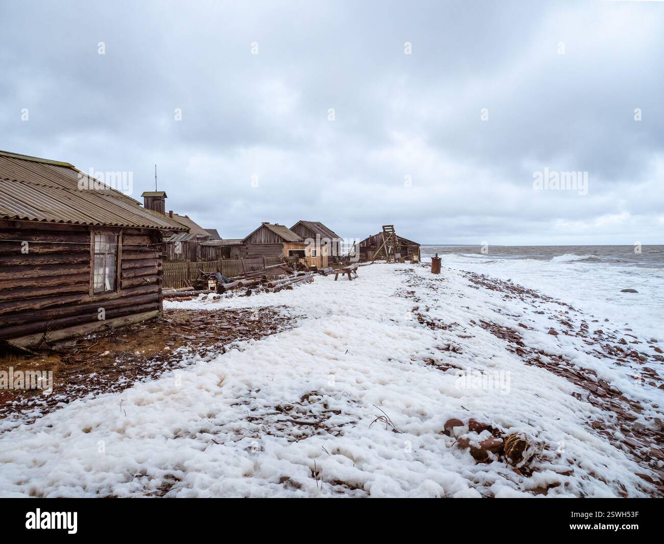 Authentic fishing village on the banks of the raging White sea. Kola ...